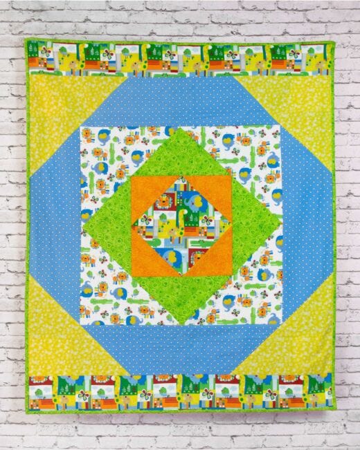 Square In A Square Lap Quilt - AccuQuilt
