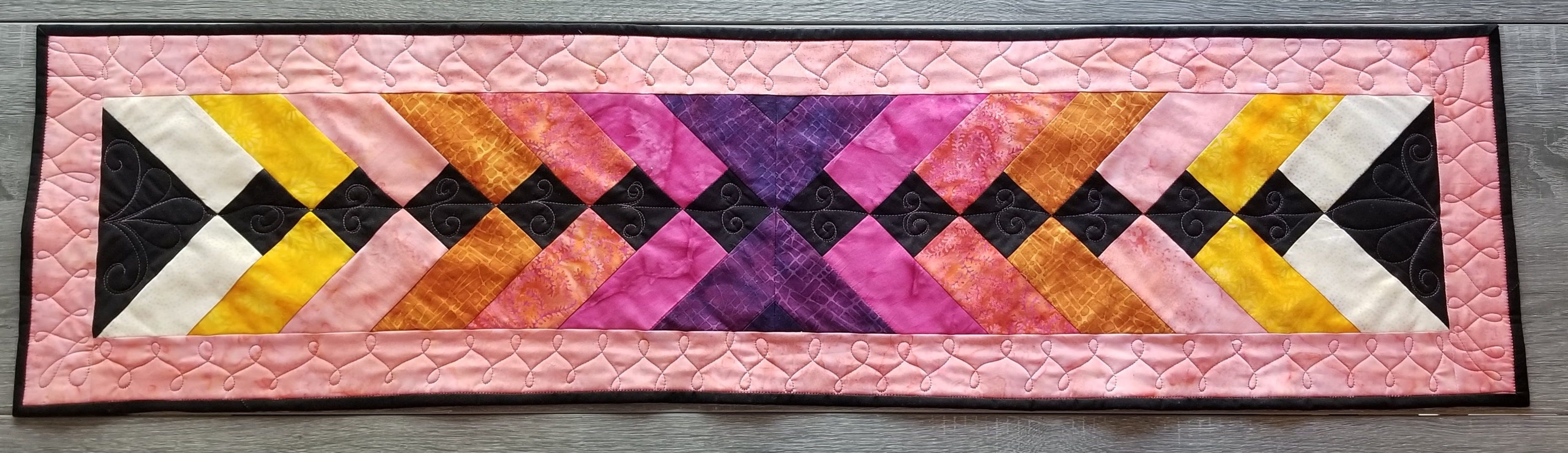 Celebrate National Sew a Jelly Roll Day with AccuQuilt!