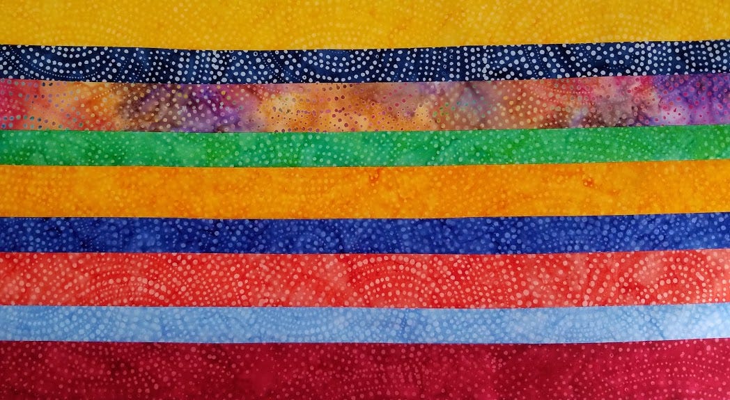 Stash Bust with this Scrappy Strip Cutter Appliqué Technique